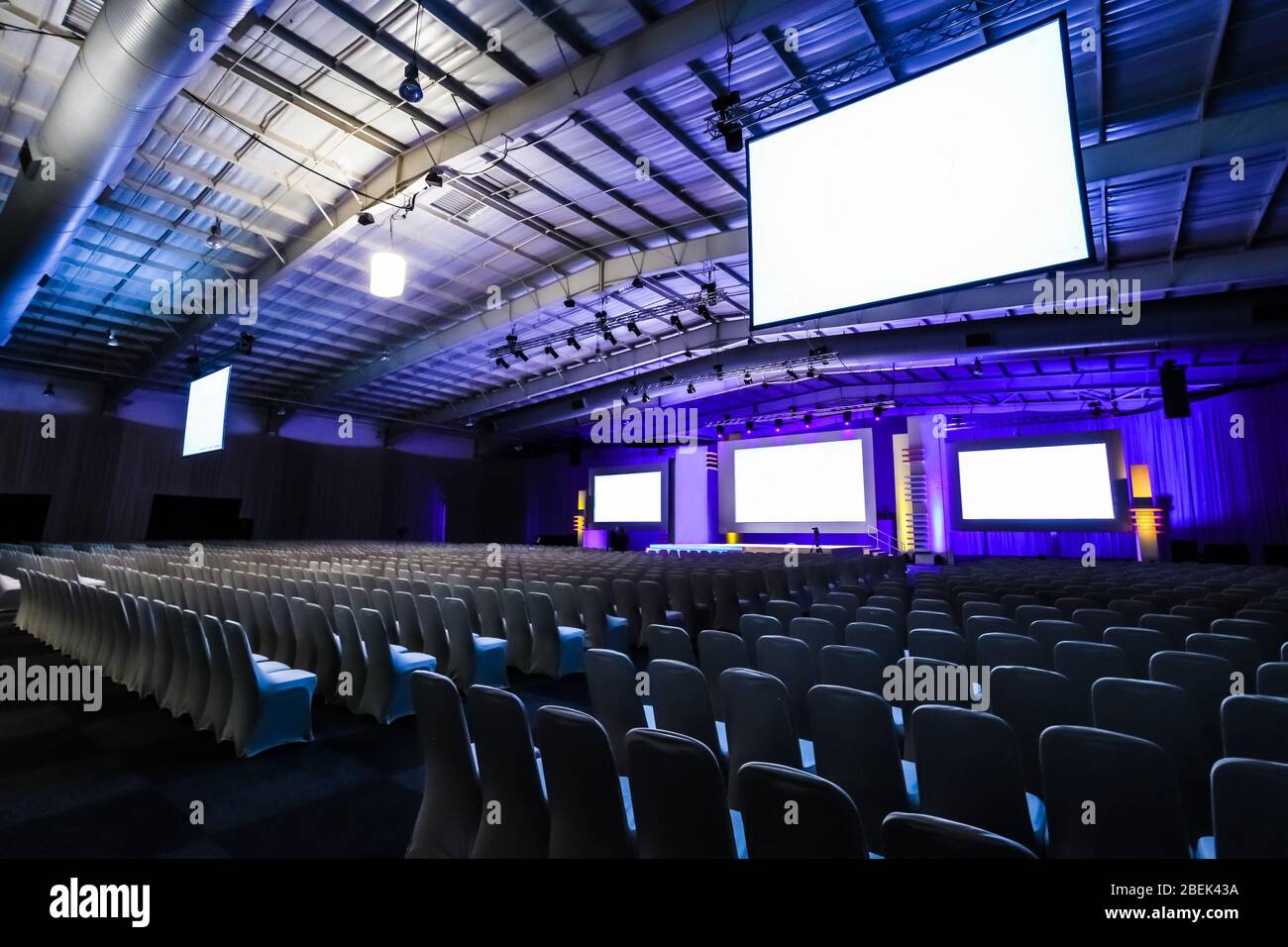 Rows of empty chairs in large Conference hall for Corporate Convention ...