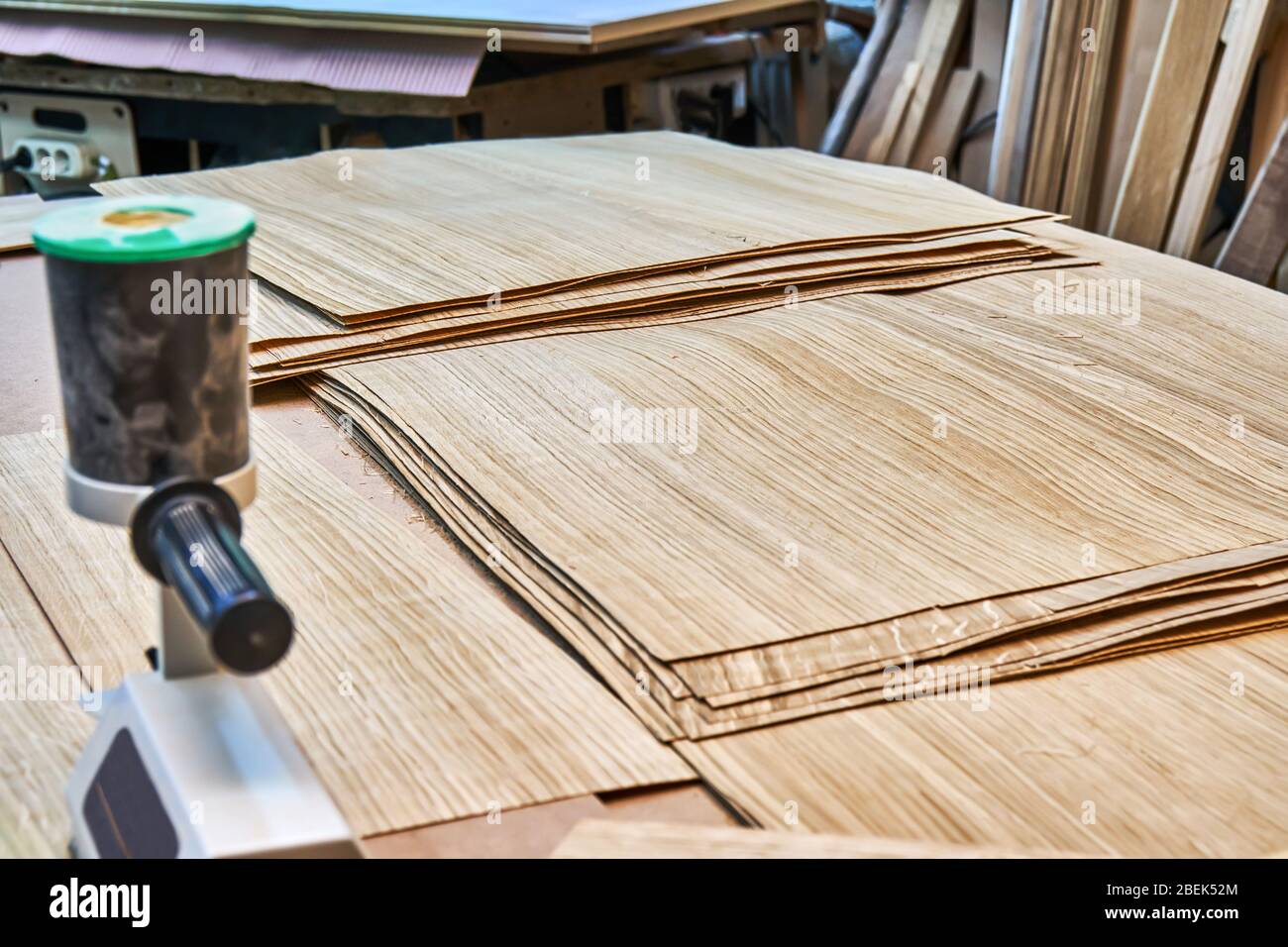 Oak veneer. Oak texture. Veneer splicing process with veneer hand ...