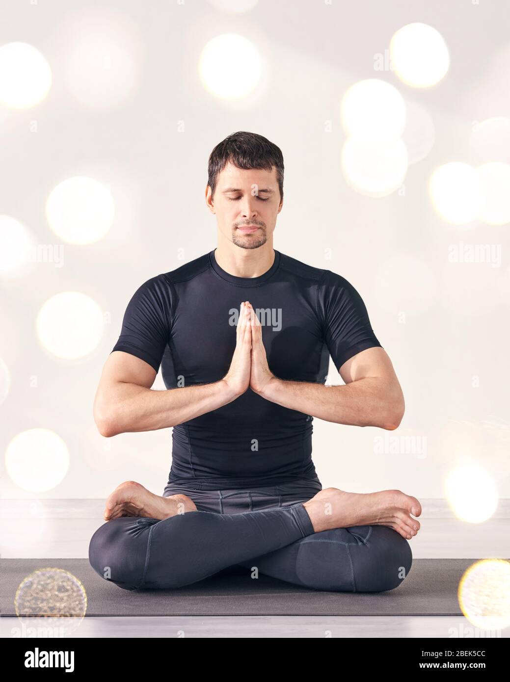 Yoga man hands. Namaste arm position. Gym studio Stock Photo - Alamy