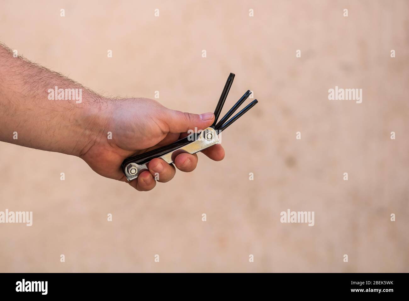 Tools for repair and building. Hand holding set of special keys (imbus ...