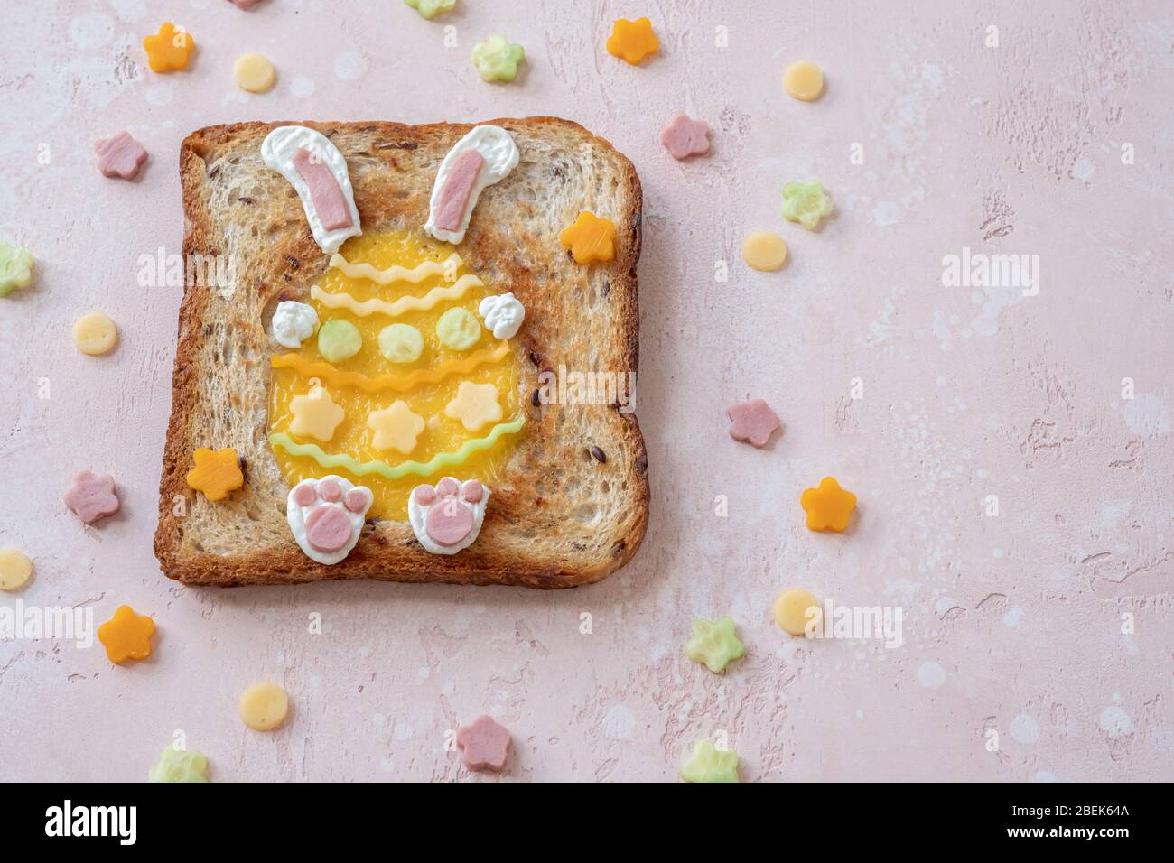 Easter egg in the hole toast with bunny ears Stock Photo - Alamy