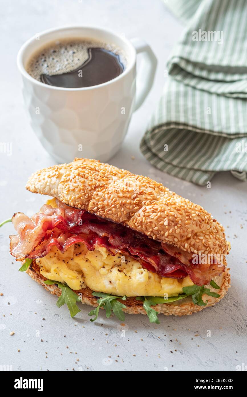 Breakfast bun with scrambled eggs and bacon Stock Photo - Alamy