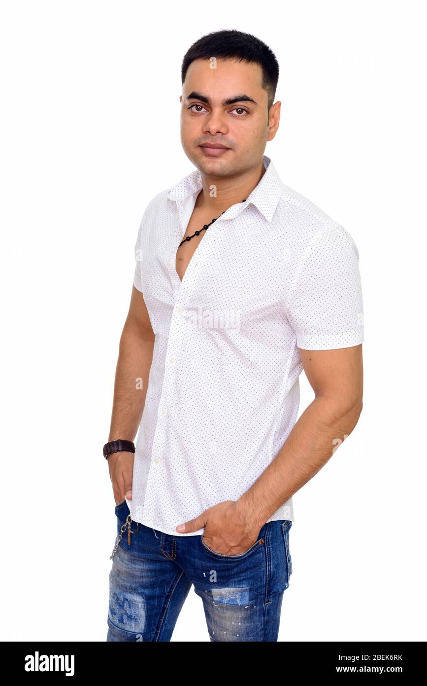 Portrait of young handsome Indian man looking at camera Stock Photo - Alamy