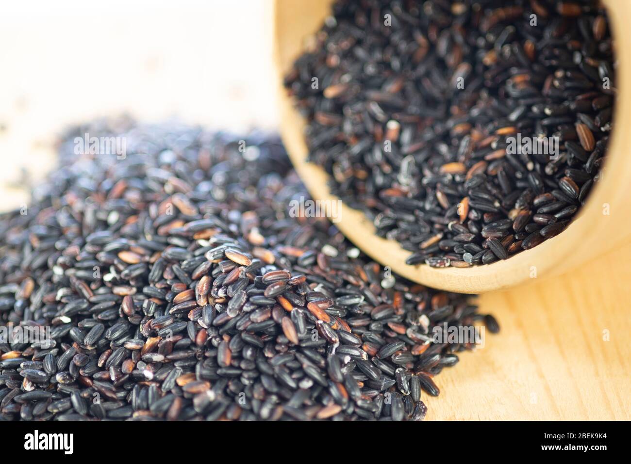 Wooden Cup of a Black Rice Stock Photo - Alamy
