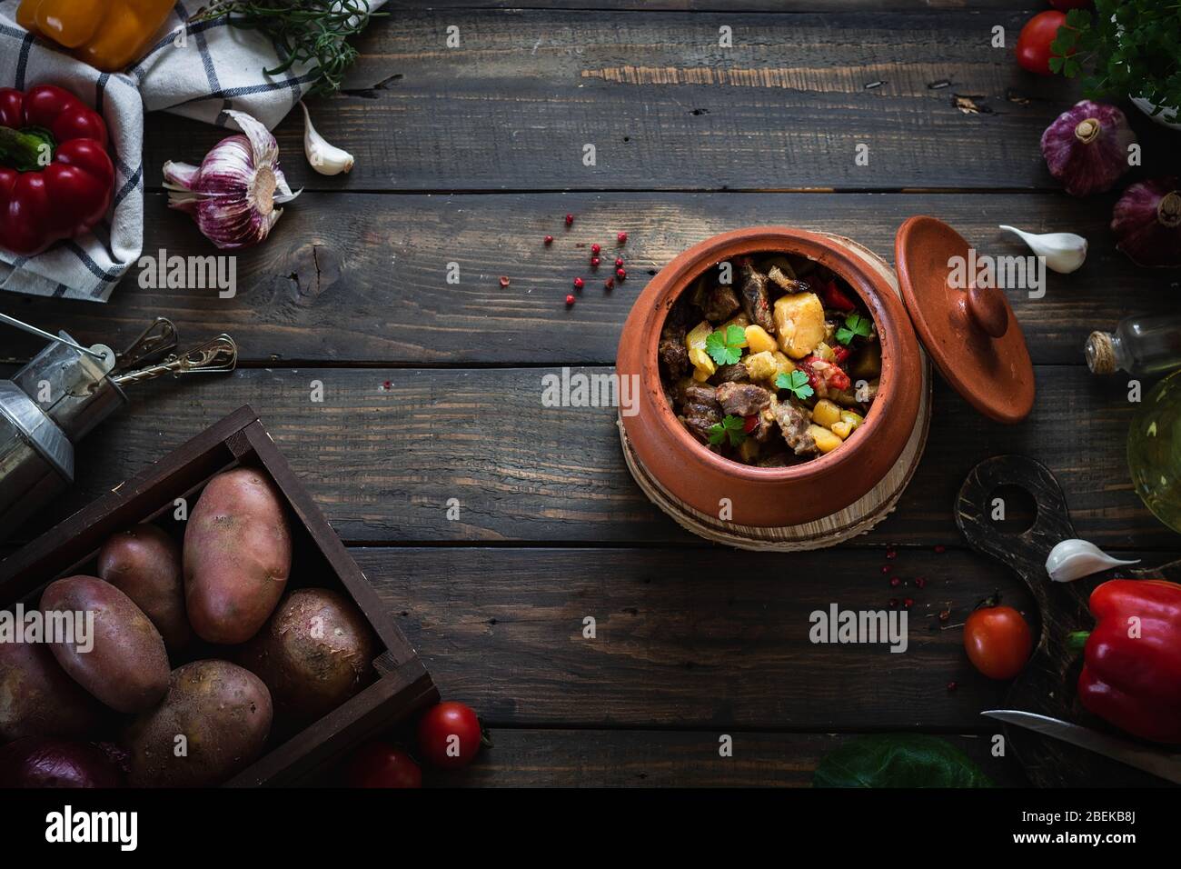 Roast in a clay pot in a rustic style. Braised beef with vegetables ...