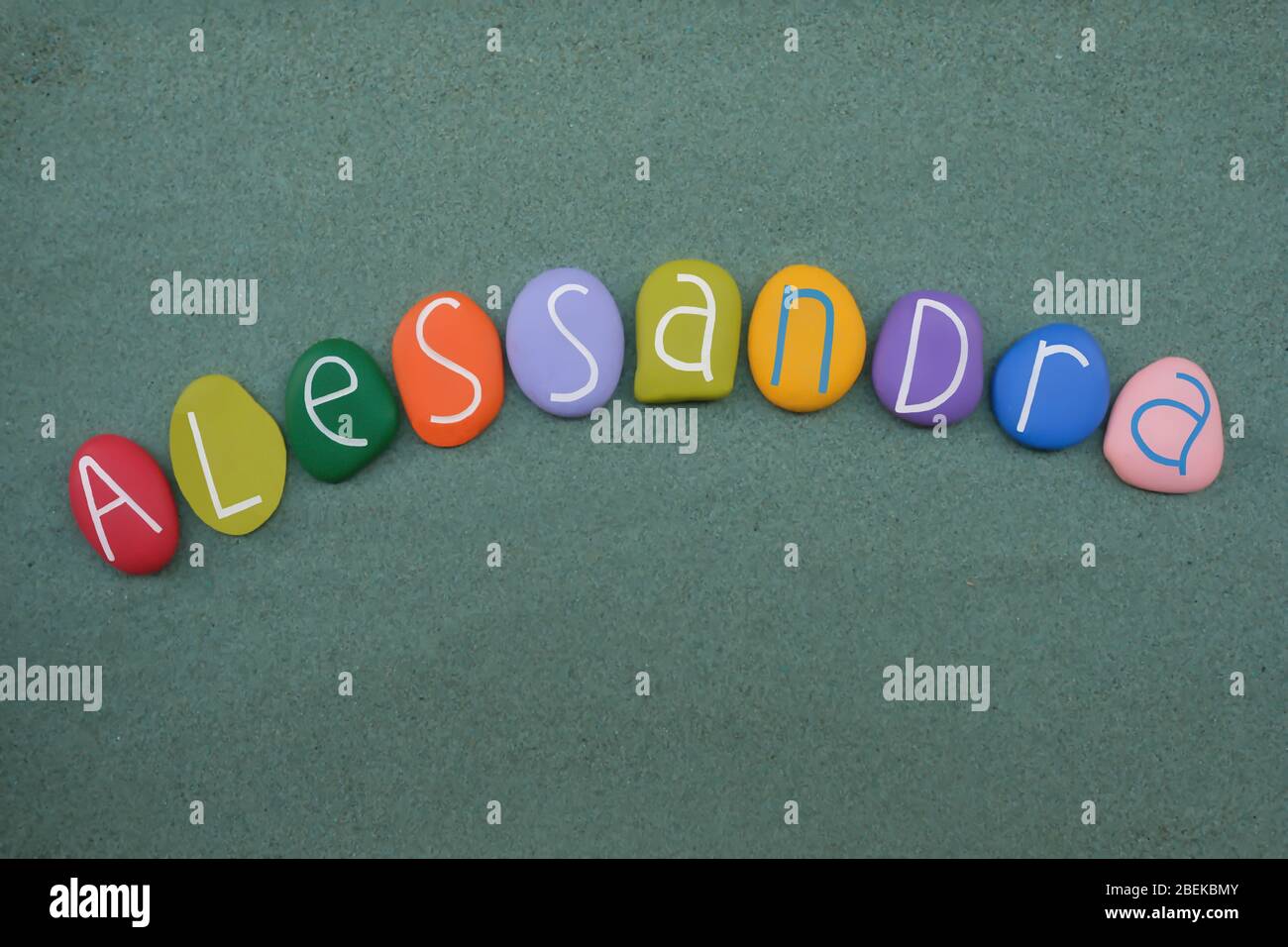 Alessandra, female given name composed with multi colored stone letters ...