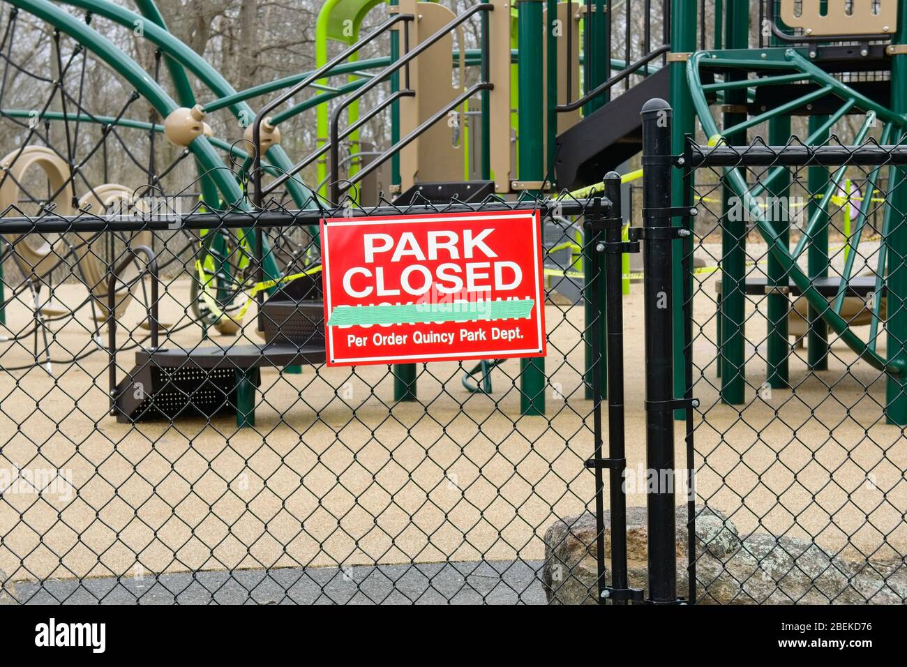 April 12, 2020 - Quincy, MA. Signs and tape showing the closing of a ...