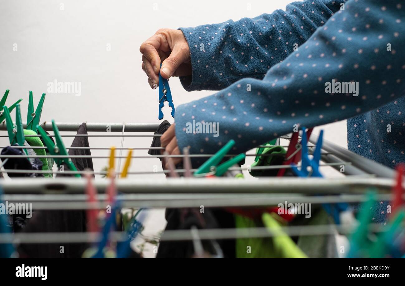closeup shot of a human being hanging their newly washed clothes Stock ...