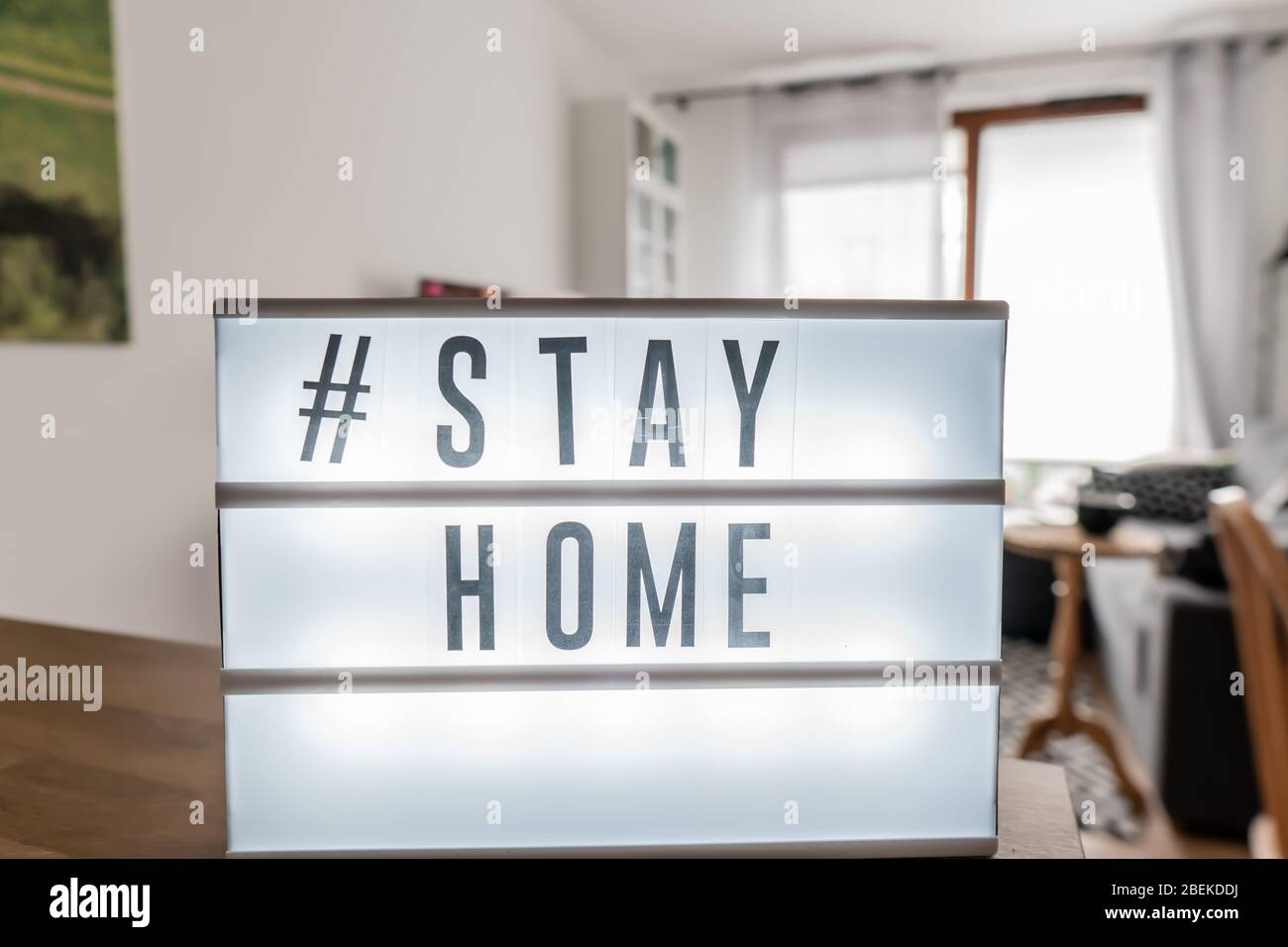 Lightbox sign with hashtag; Stay Home against the background of the ...