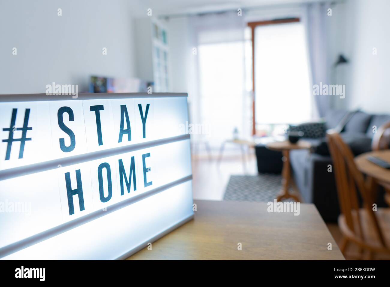 Lightbox sign with hashtag; Stay Home against the background of the ...