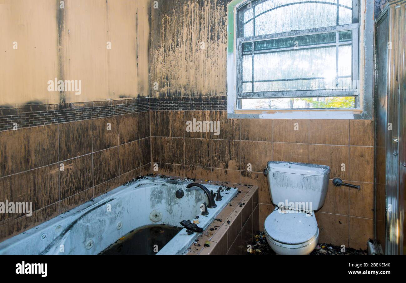 Burned house interior after fire, a toilet after fire inside Stock ...