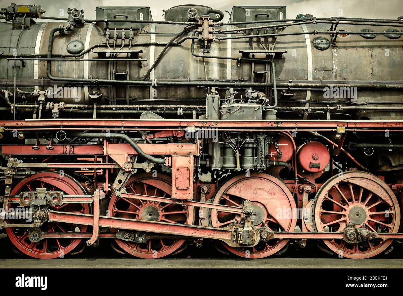 Retro styled side view of an old rusted steam locomotive Stock Photo ...