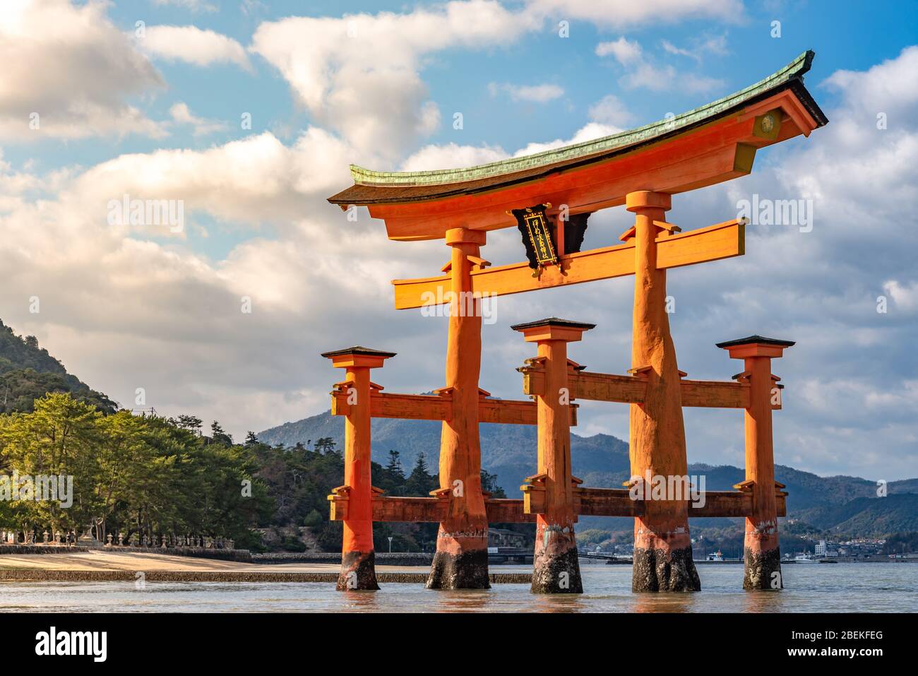 Floating orange red giant Grand O-Torii gate stands in Miyajima island ...