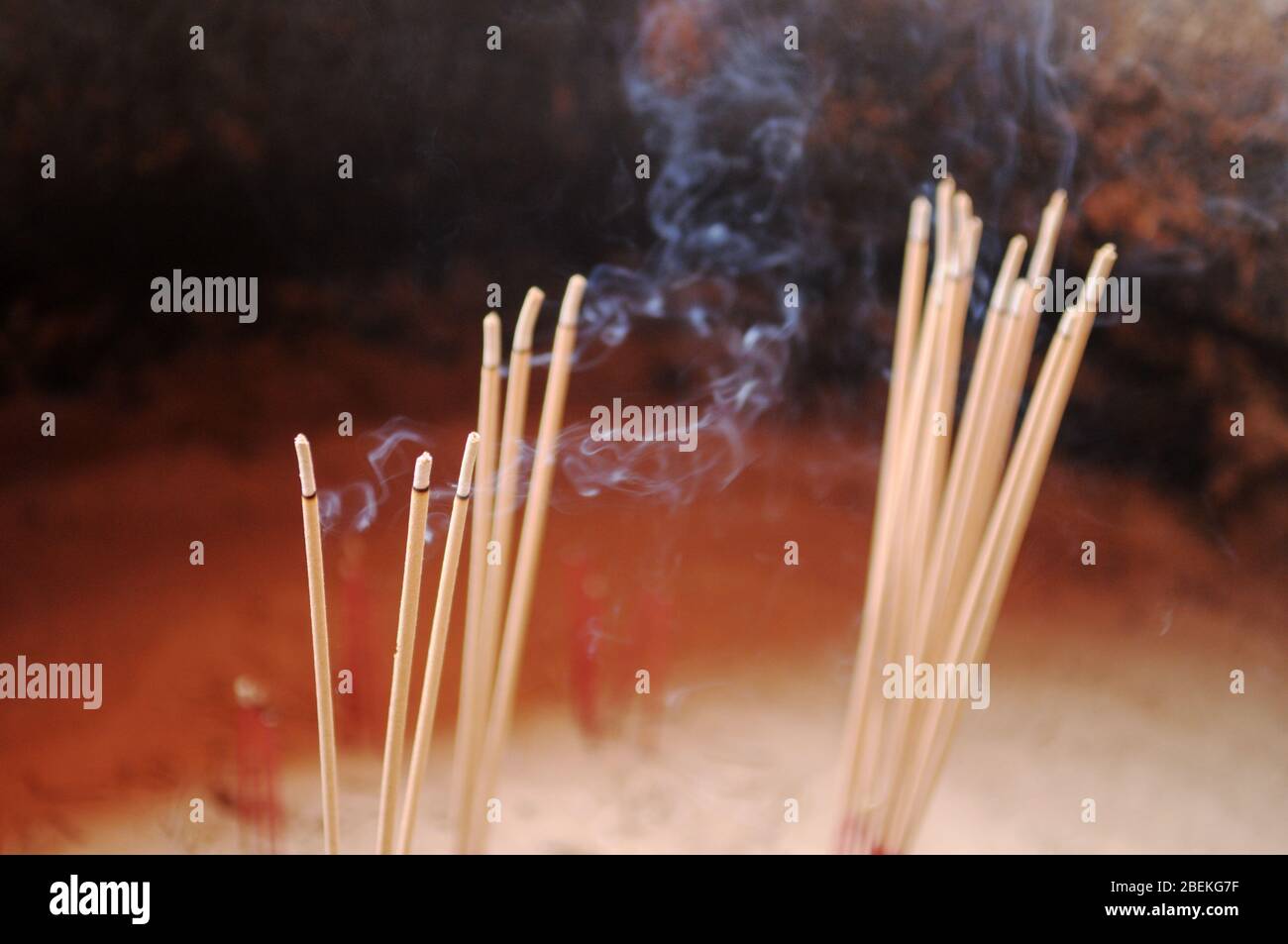 The many smouldering brown aromatic sticks Stock Photo - Alamy