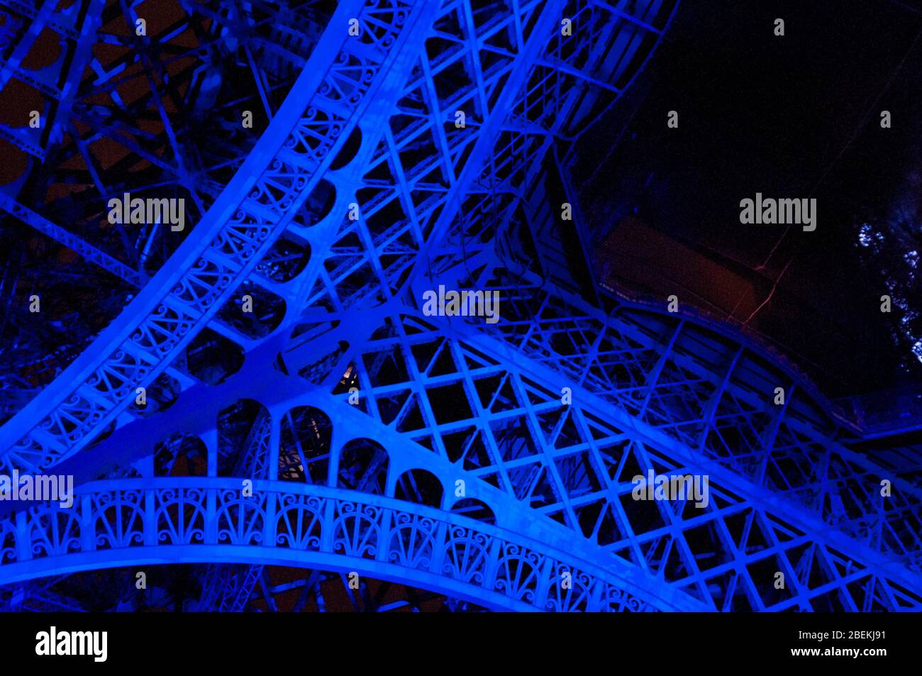 Curves and filagree of the Eiffel Tower in Paris Stock Photo - Alamy