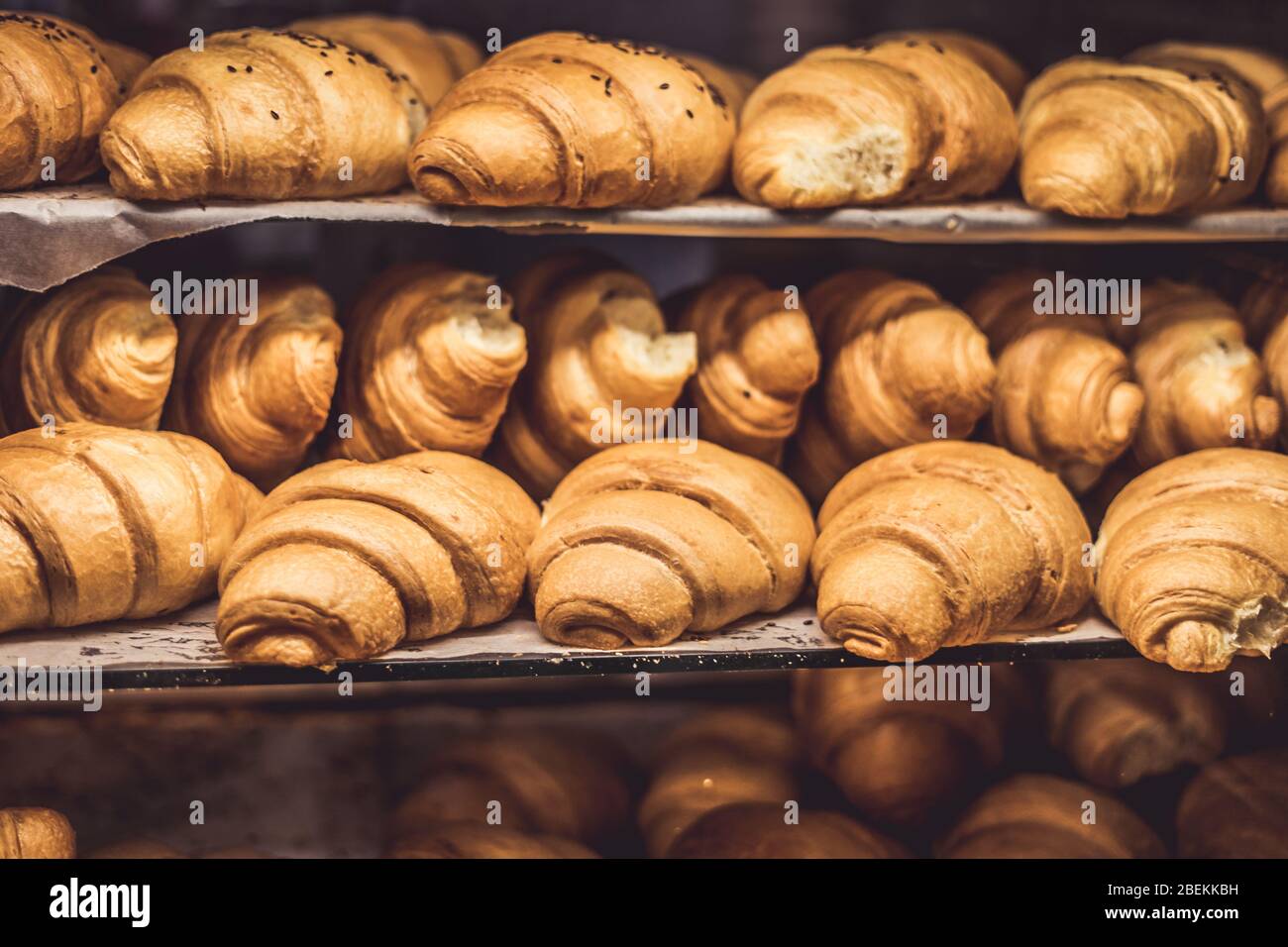 Croissants on a showcase in a bakery shop Stock Photo - Alamy