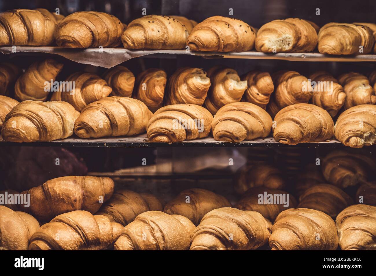 Croissants on a showcase in a bakery shop Stock Photo - Alamy
