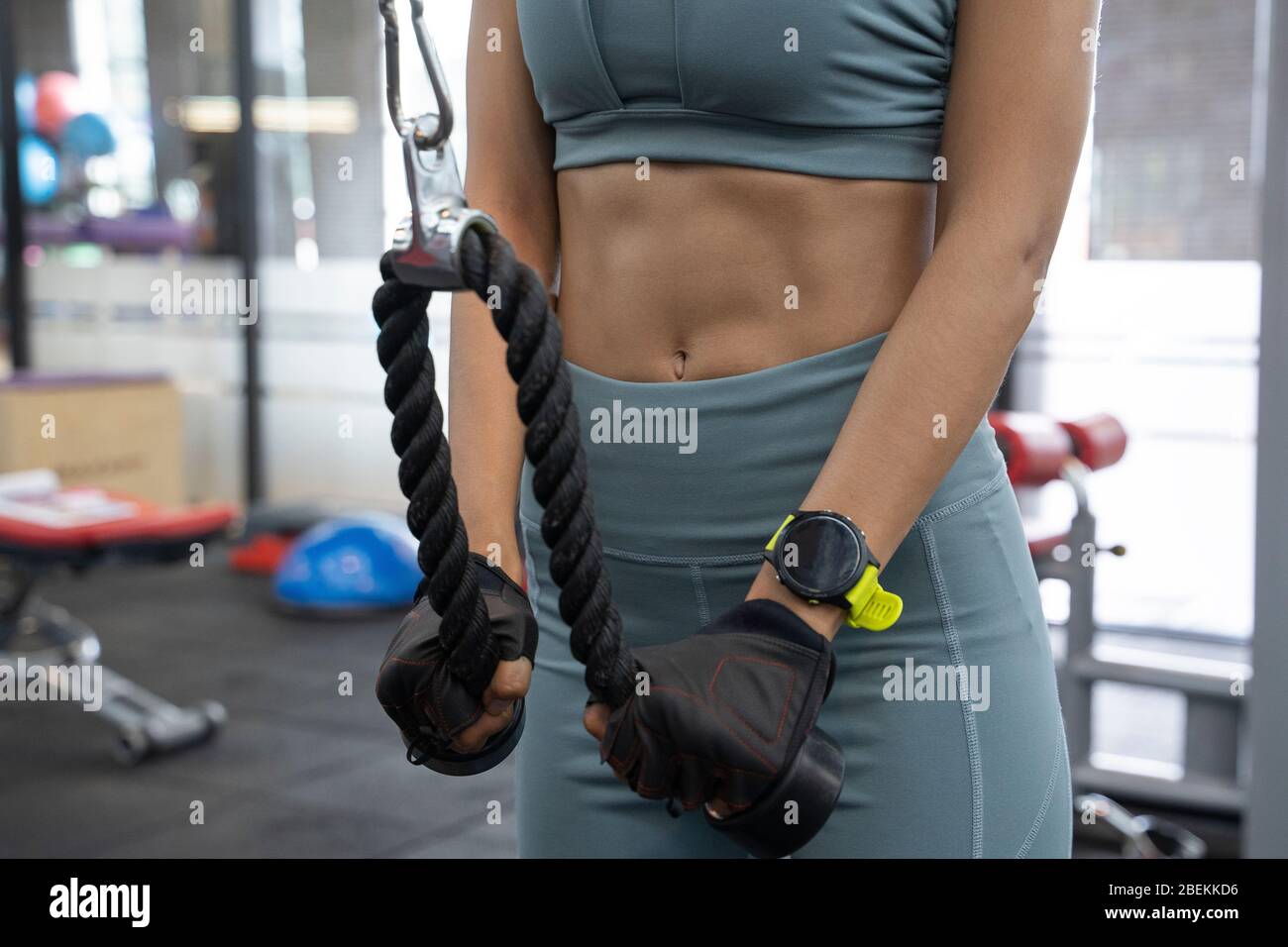 Woman training with machine Stock Photo - Alamy