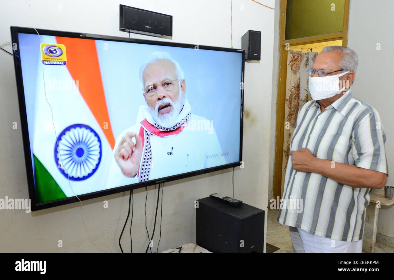 Elderly man watches Indian Prime Minister Narendra Modi's address to ...