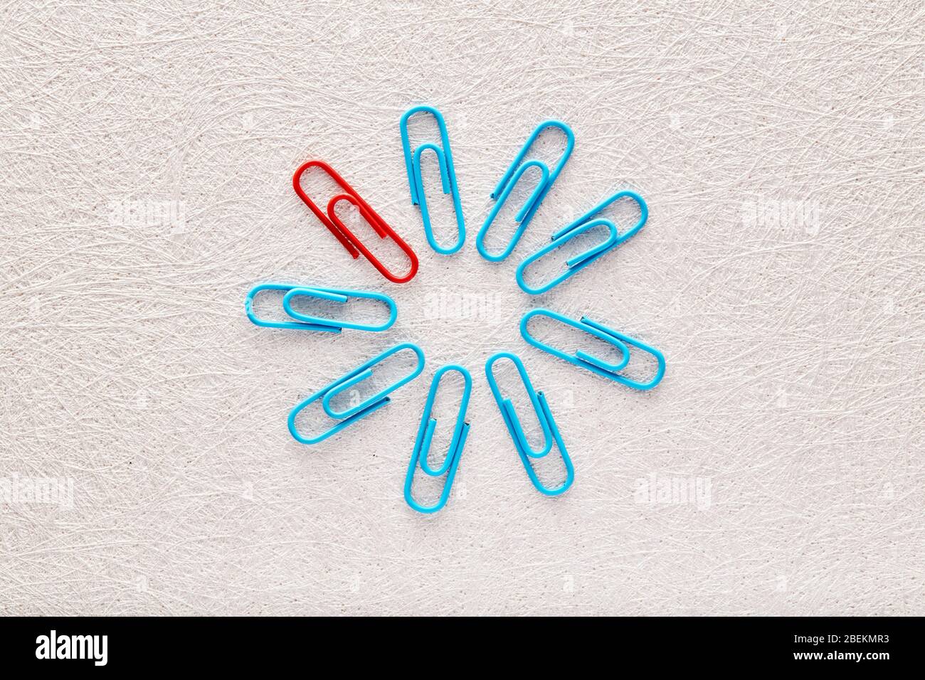 Colorful paper clips designed as arrows pointing at different ...