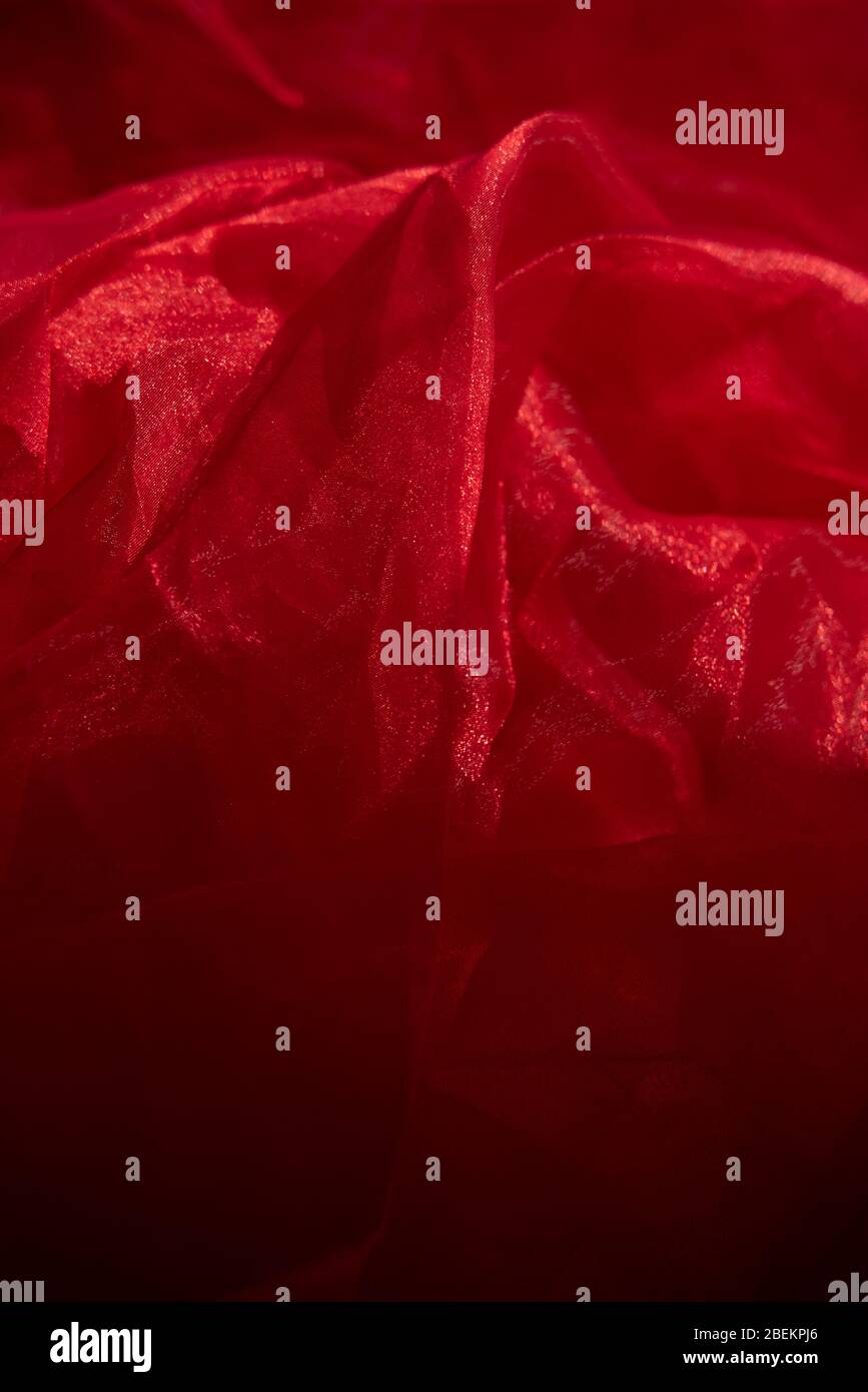 Organza red. Abstract background red chiffon organza. texture ...