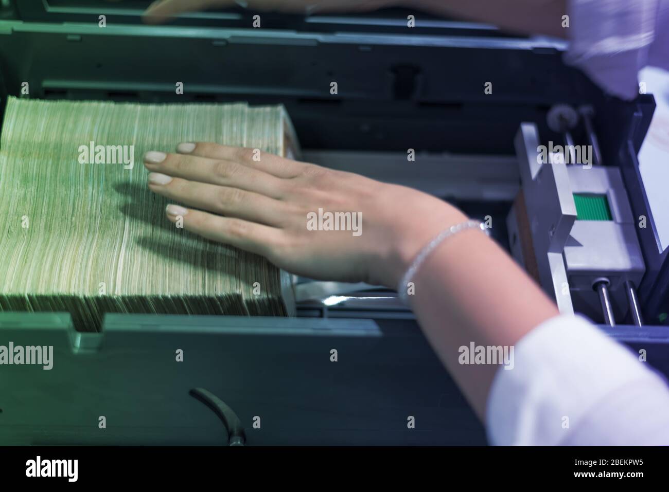 Carton boxes filled with sorted money and stored in a cage in the ...