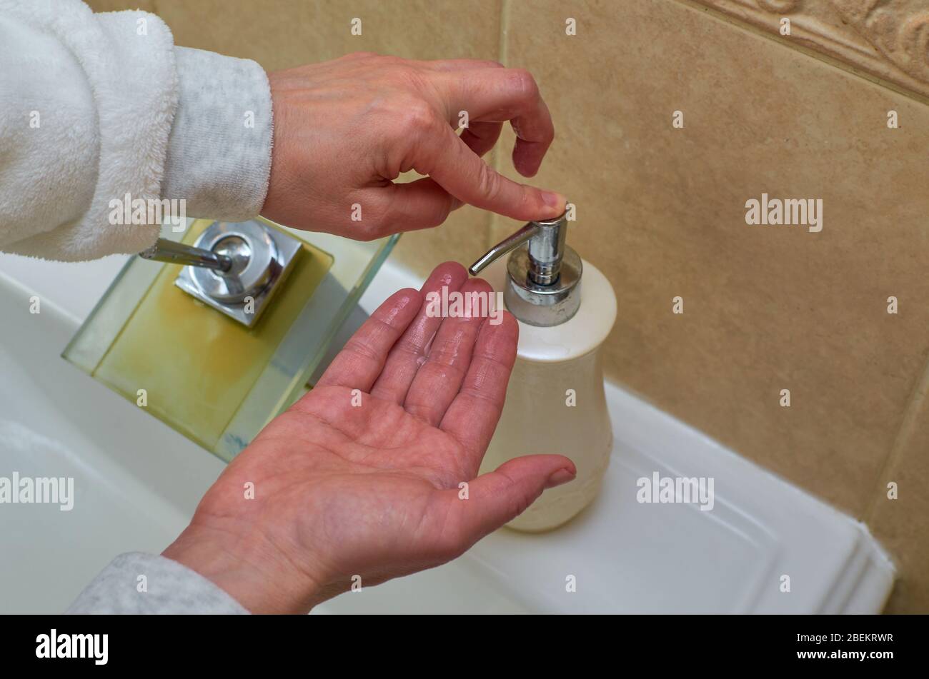 Washing disinfecting hands liquid hi-res stock photography and images ...