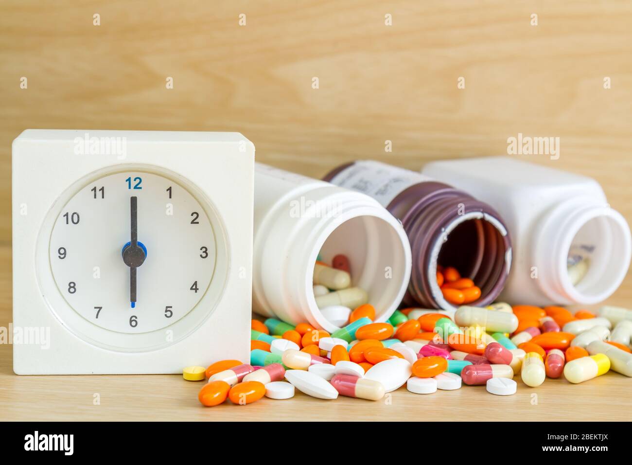 Medicine is pill and capsule clock show 6 am or pm with copy space on ...