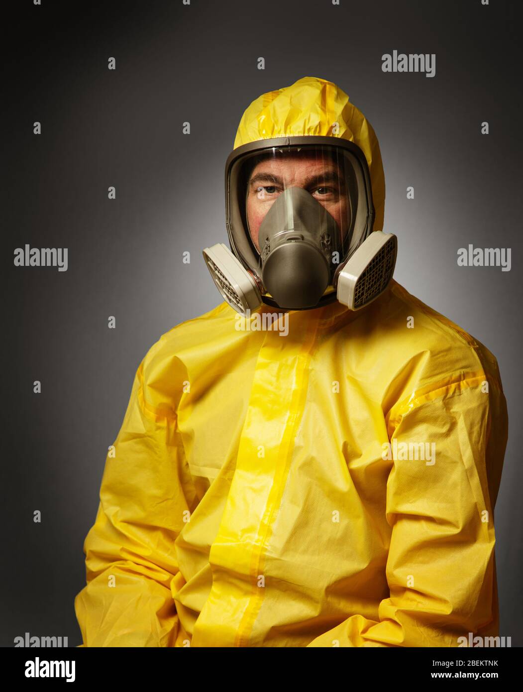 Scientist protective yellow hazmat suit hi-res stock photography and ...