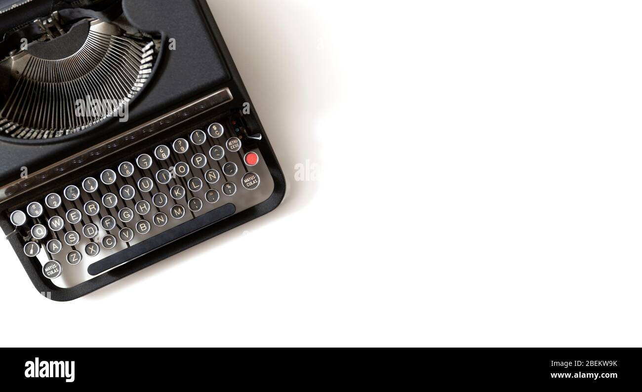 Retro black typewriter on white background with with copy space for ...