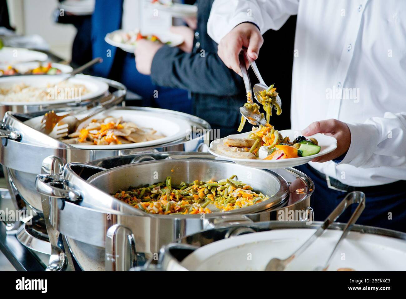 Men in suits dinner table hi-res stock photography and images - Alamy