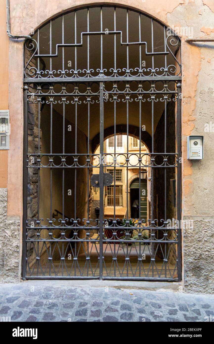 Wrought iron gate in italy hi-res stock photography and images - Alamy