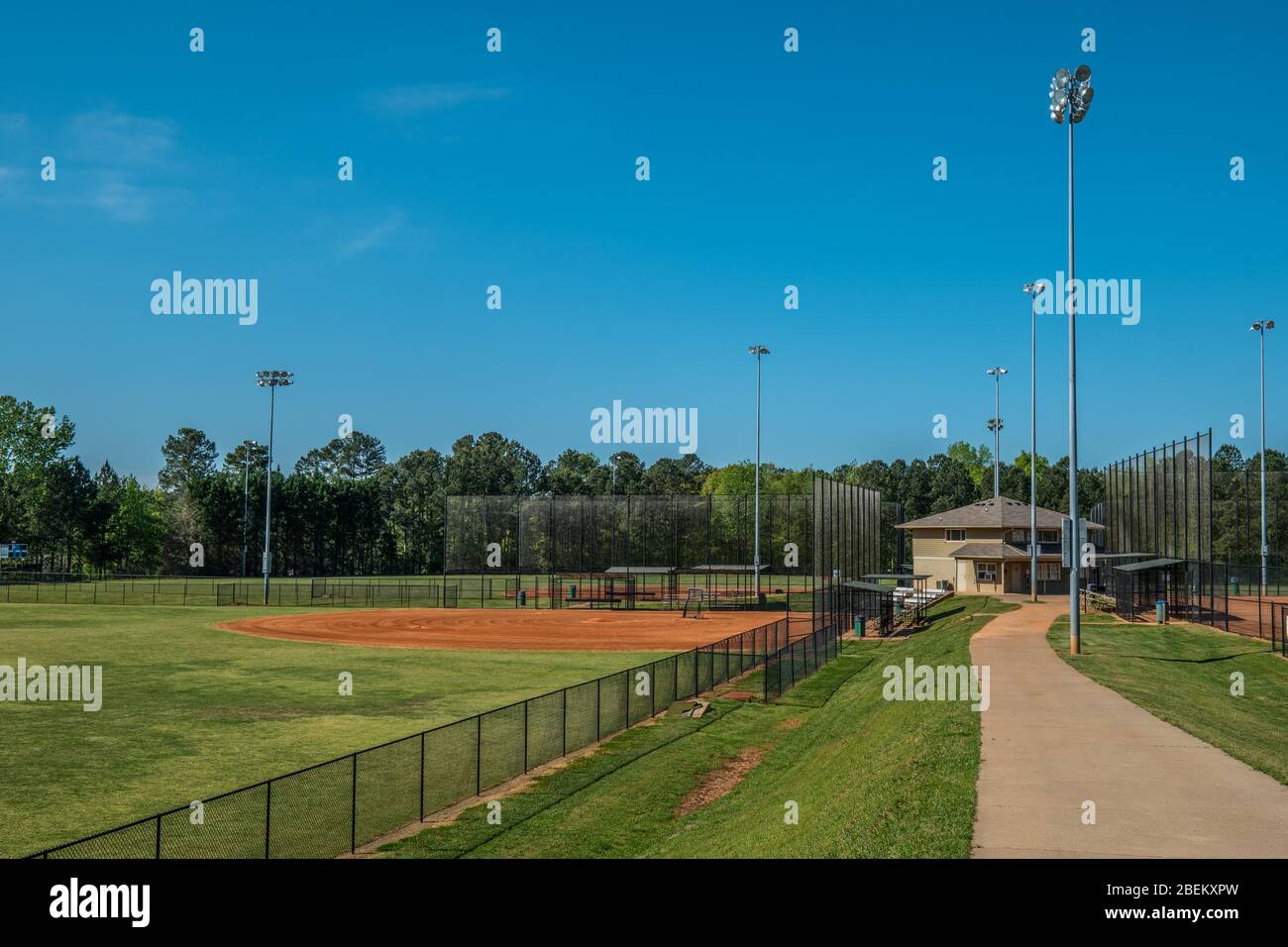 An empty and vacant baseball fields closed in the springtime due to the ...