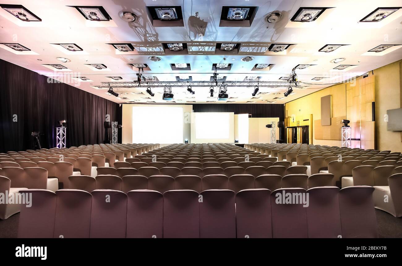 Rows of empty chairs in large Conference hall for Corporate Convention ...