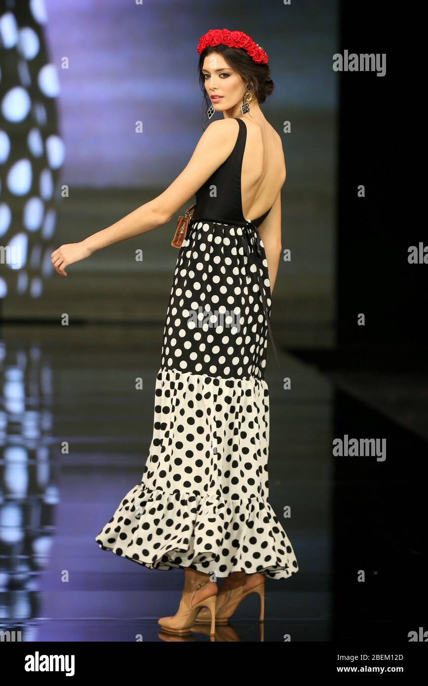 SEVILLA, SPAIN - JAN 30: Model wearing a dress from the Arpegio ...