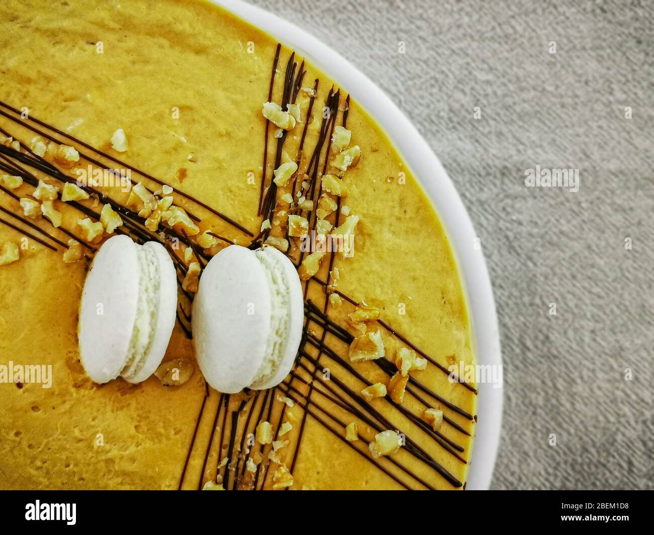 Caramel cake with powdered sugar on top, close up shot Stock Photo - Alamy