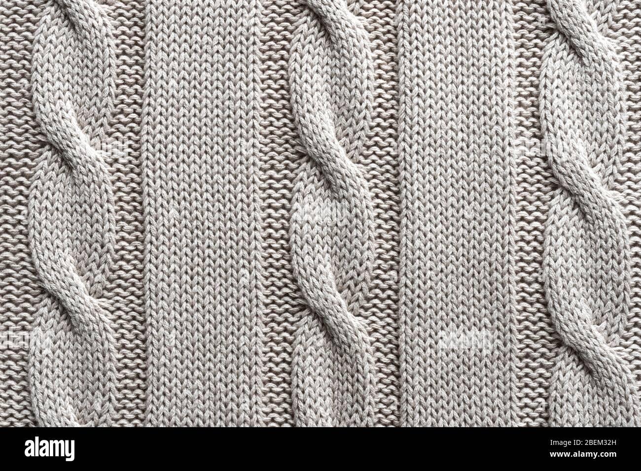 Texture gray knitted fabric with a pattern Stock Photo - Alamy