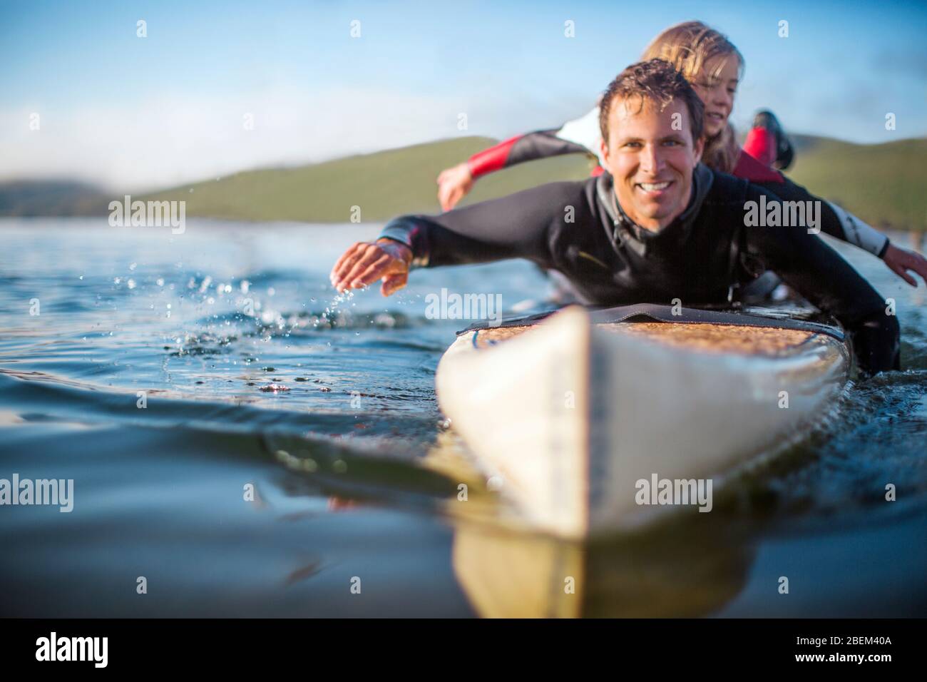 Female surfer lying on hi-res stock photography and images - Alamy