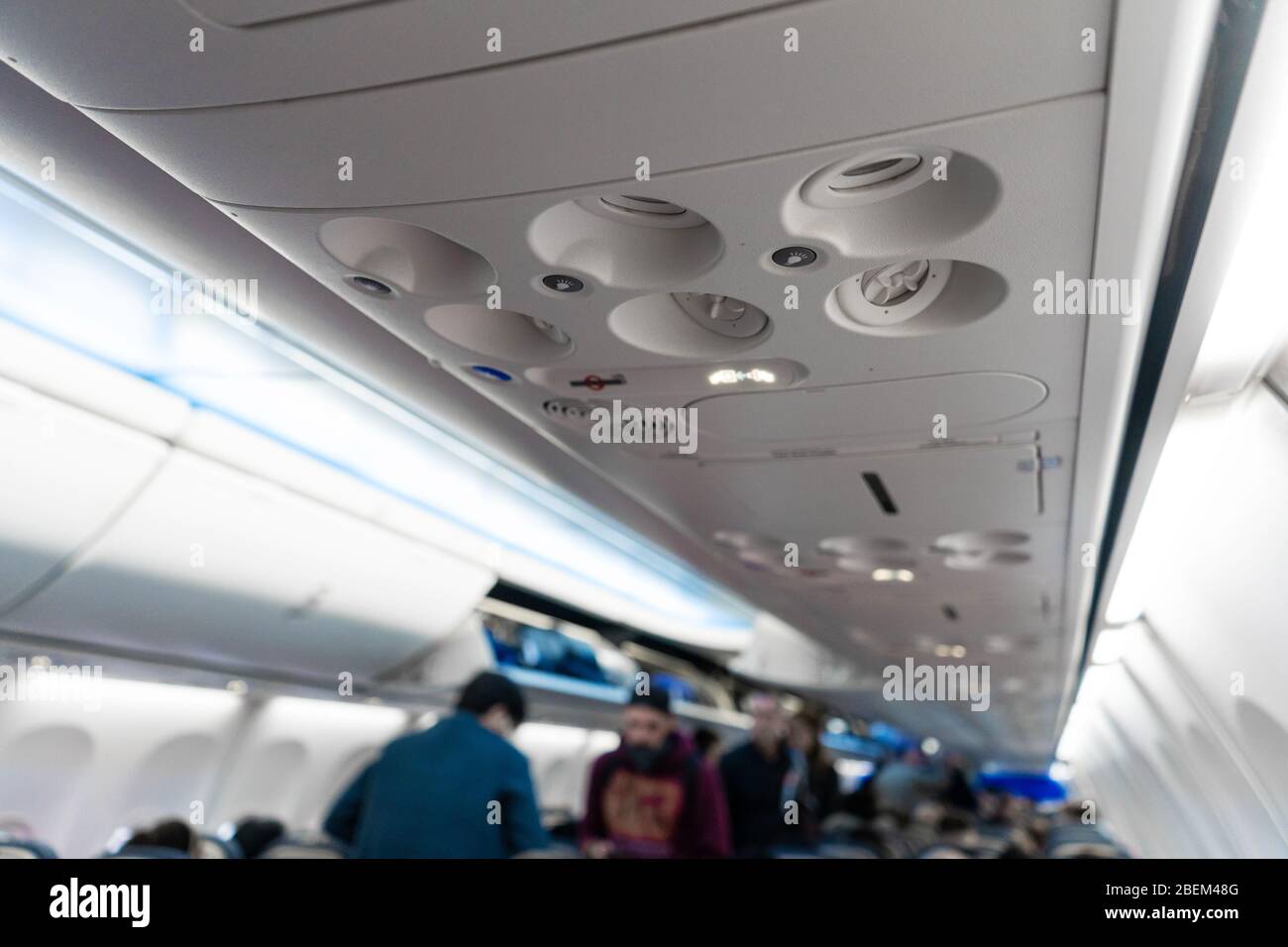 Control panel for ventilation and lighting in a passenger seat in an ...