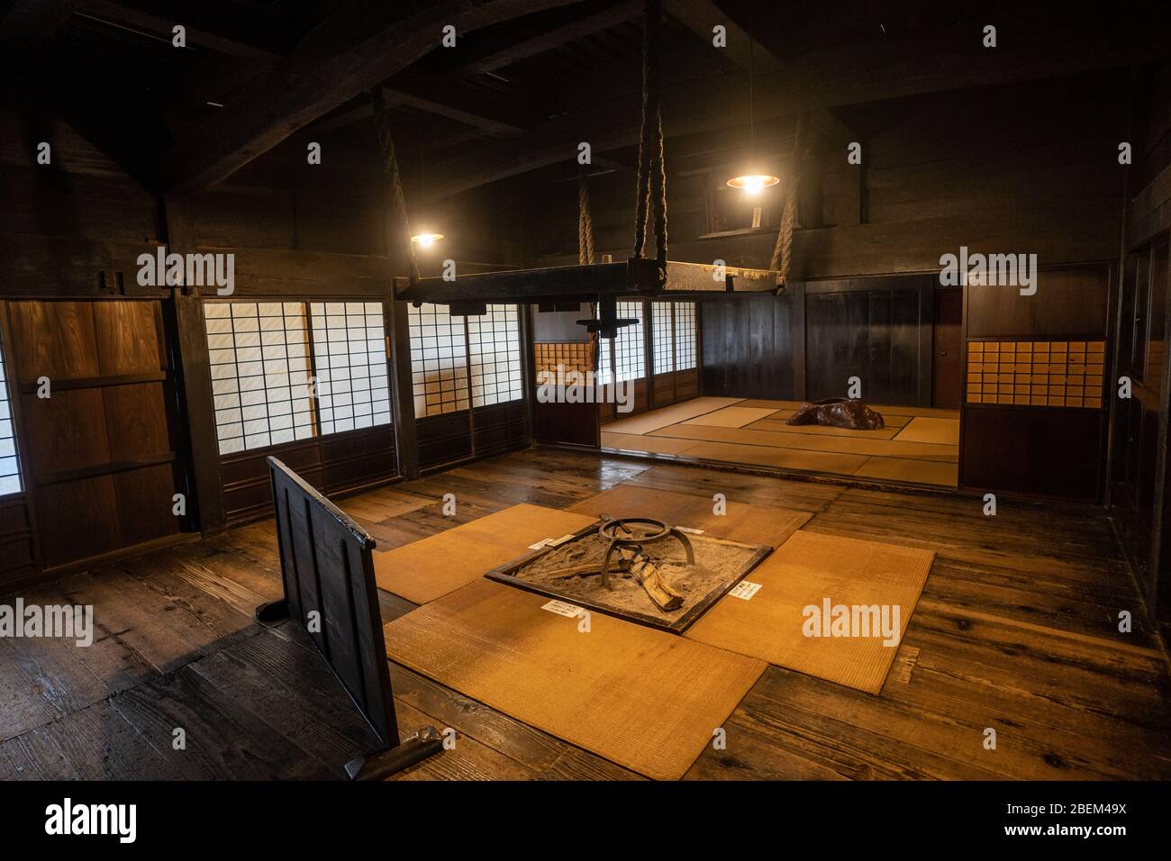 Sunken hearth fire at the Hida Folk Village (Hida no Sato) traditional ...