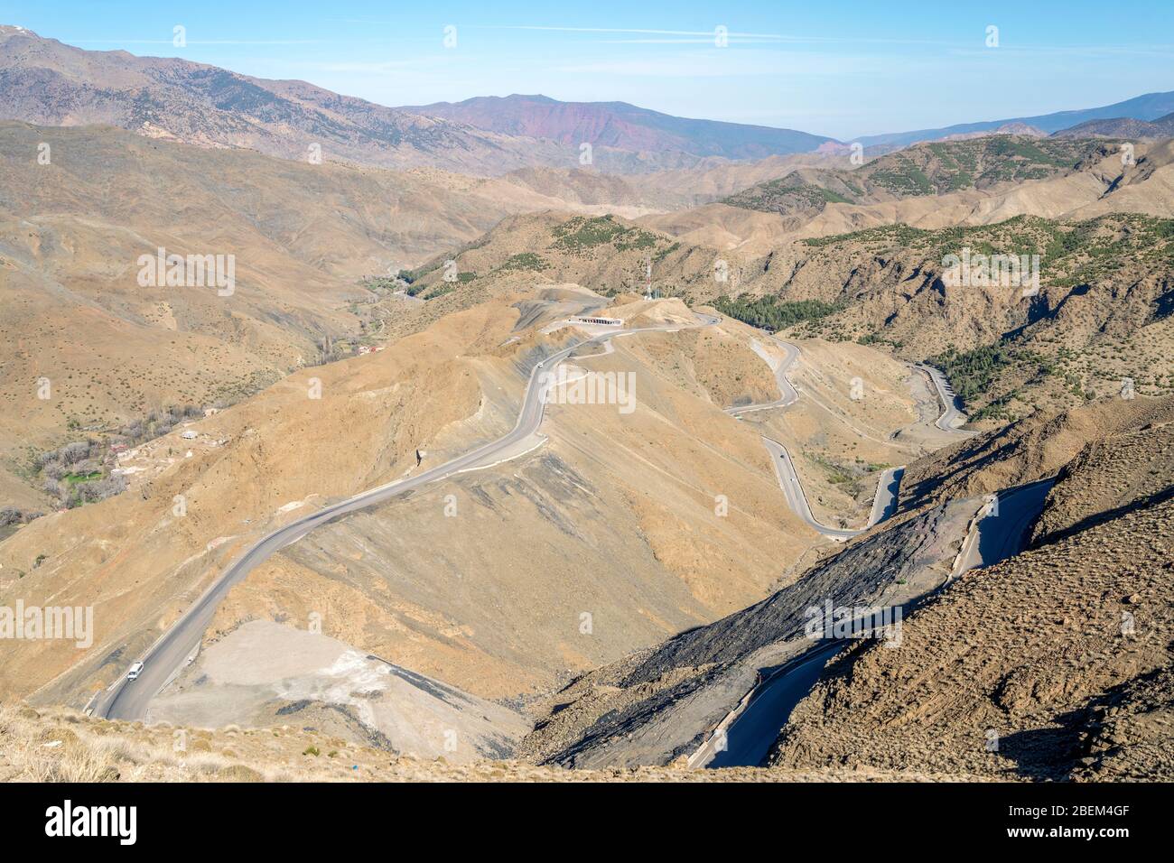 A winding road through the highest pass in beautiful Atlas Mountains ...