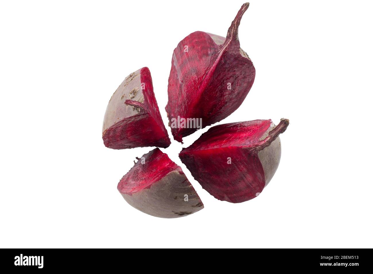 Cut into four pieces red beet isolated on white background, top view ...