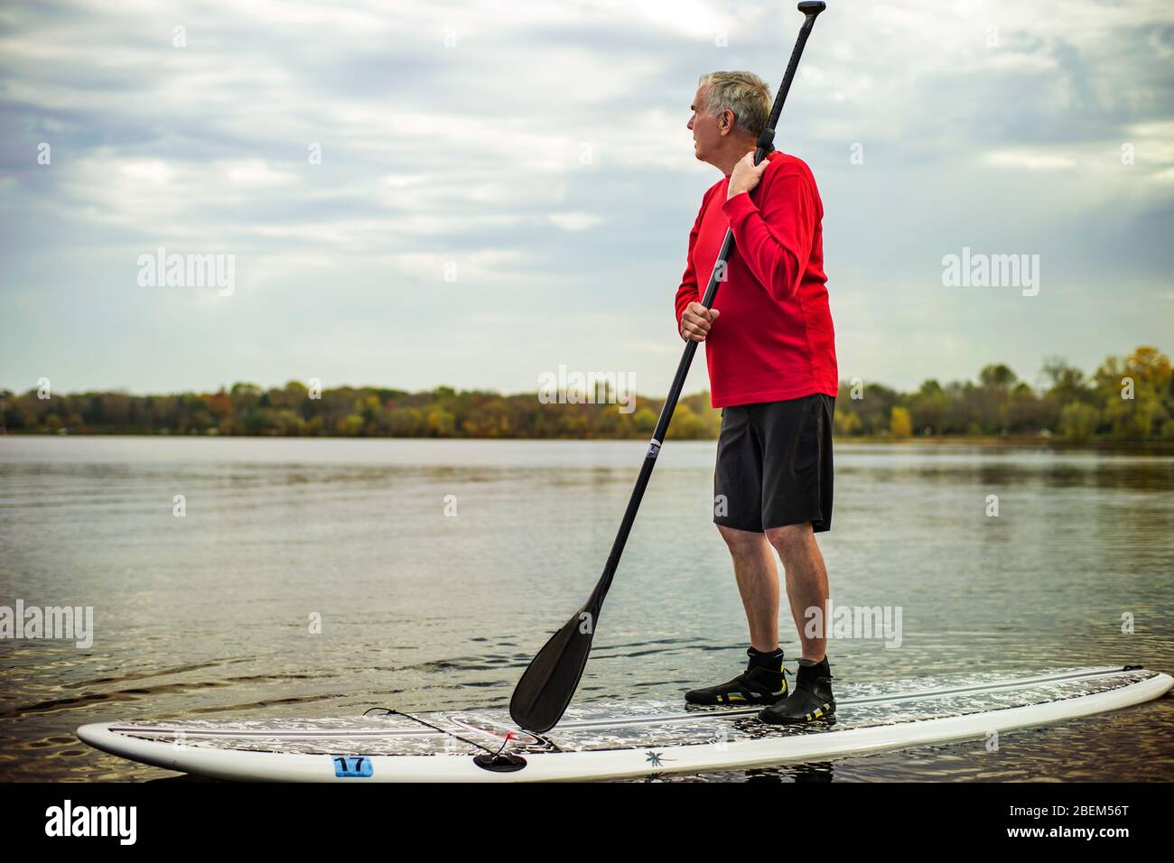 Senior man paddling stand hi-res stock photography and images - Alamy