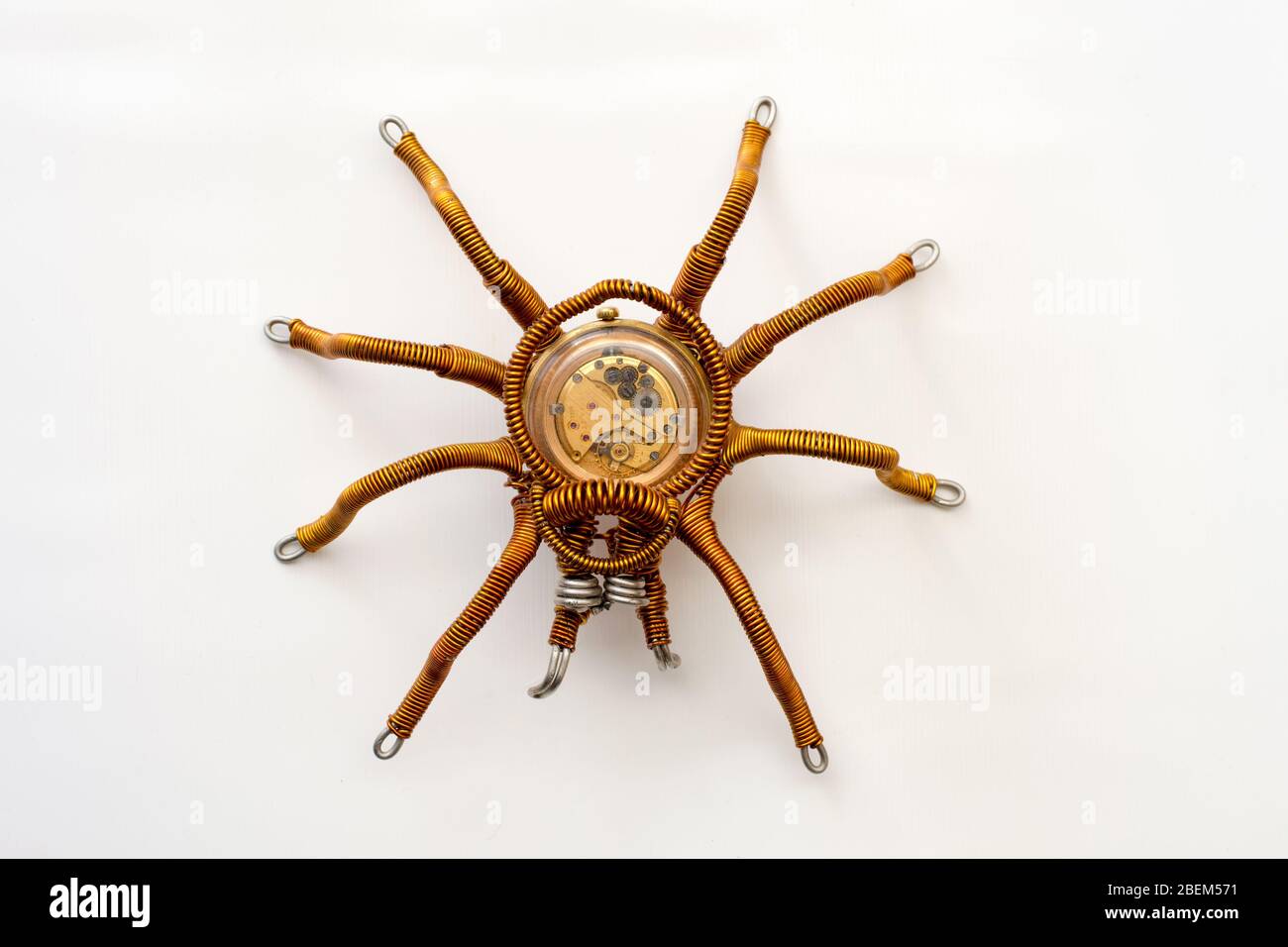 Metal spider with built-in clockwork on white background, steampunk ...