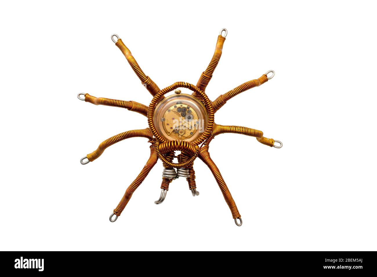Metal spider with built-in clockwork isolated on white background ...