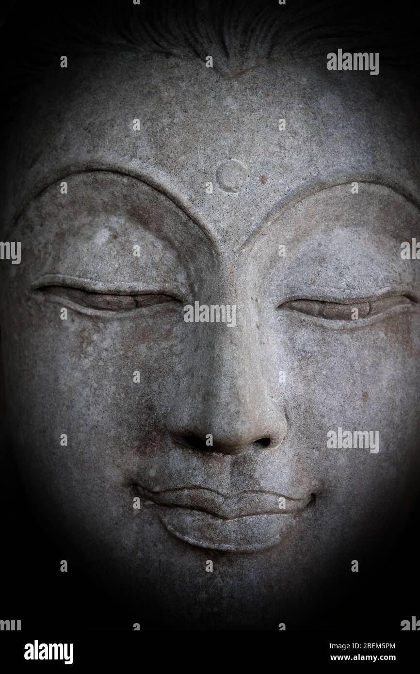 Mystical Buddha statue's face, face of ancient stone Buddha statue ...