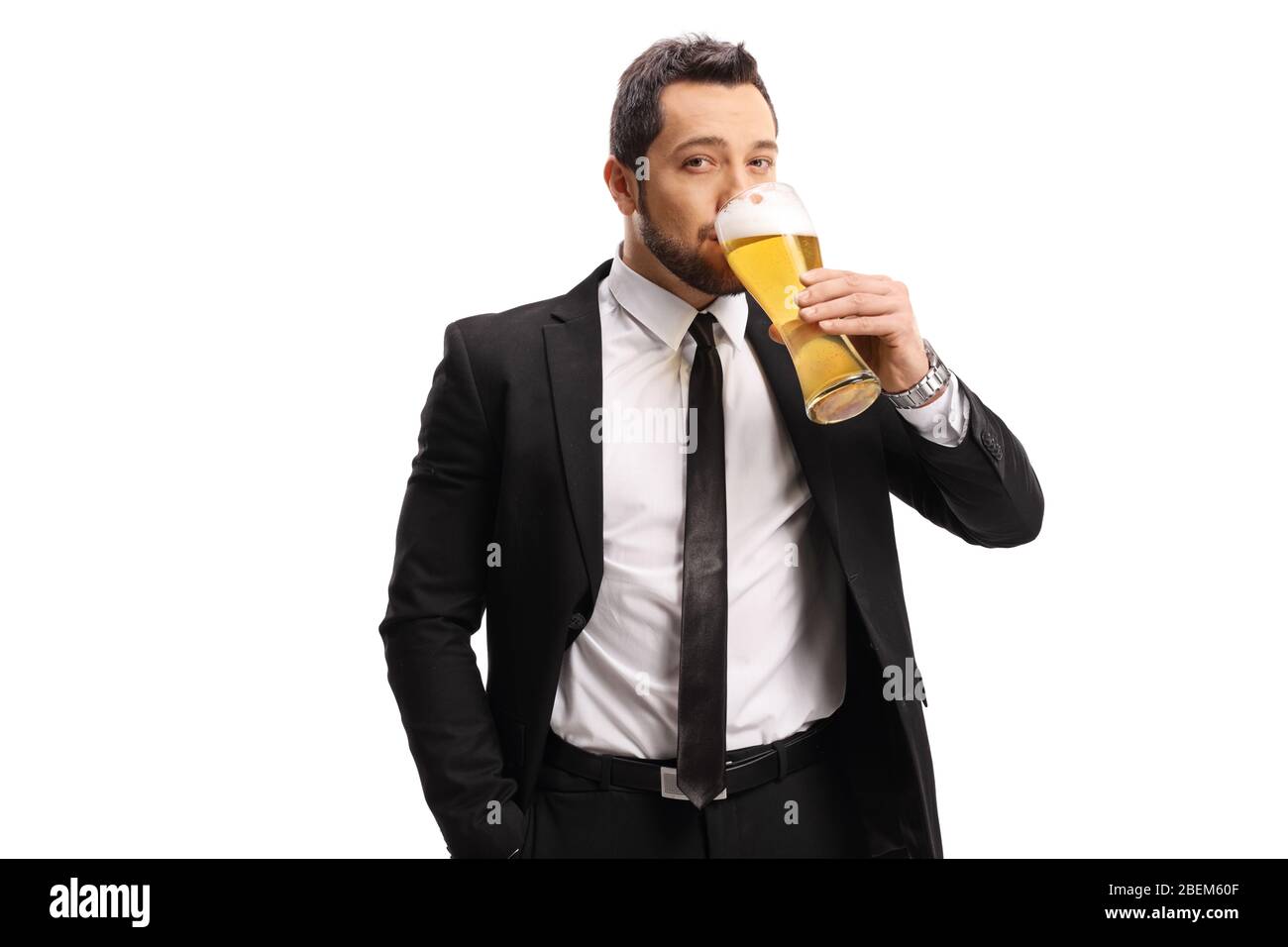 Businessman having a pint of light beer isolated on white background ...