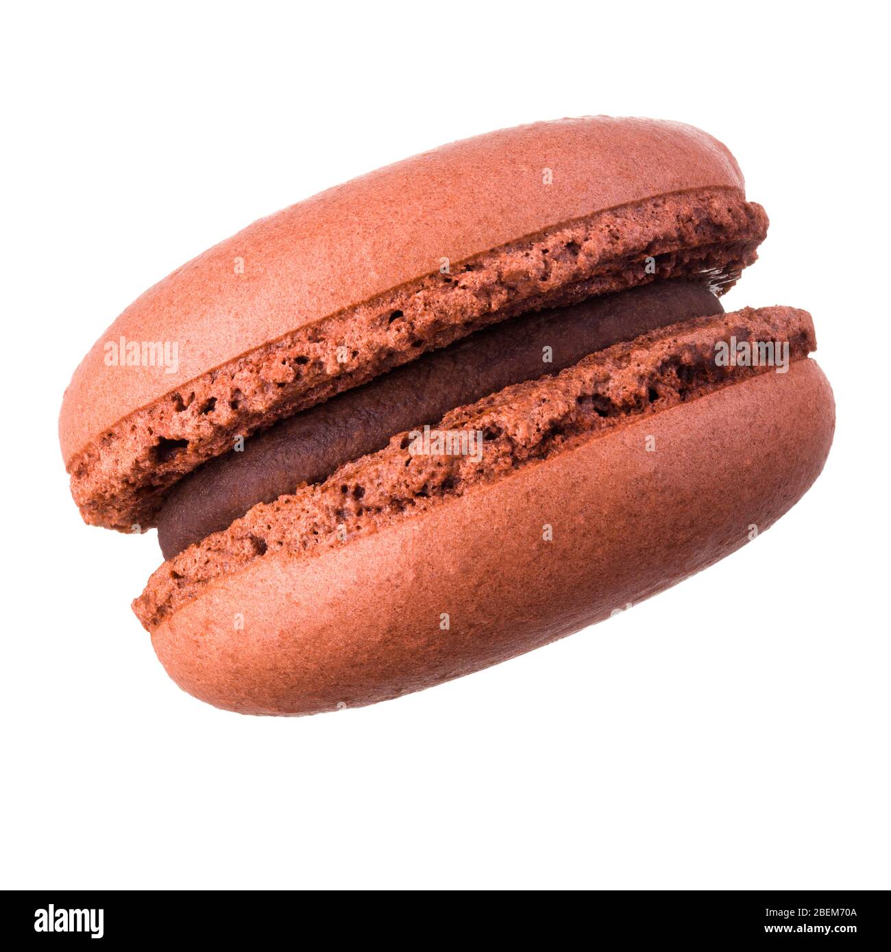 Macro photo of french caramel macaroon or macaron isolated on white ...