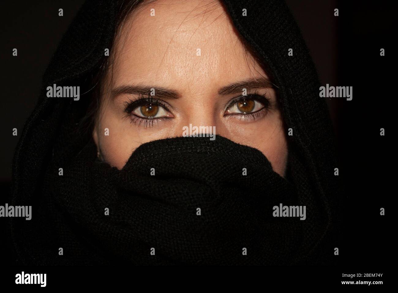 Mexican woman in black turban with big honey eyes Stock Photo - Alamy