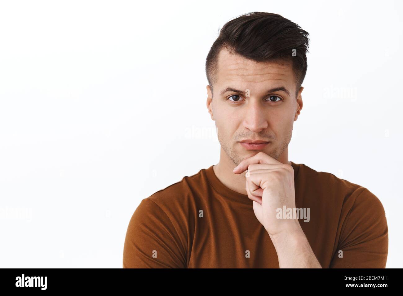 Close-up portrait of determined, serious handsome adult man thinking ...
